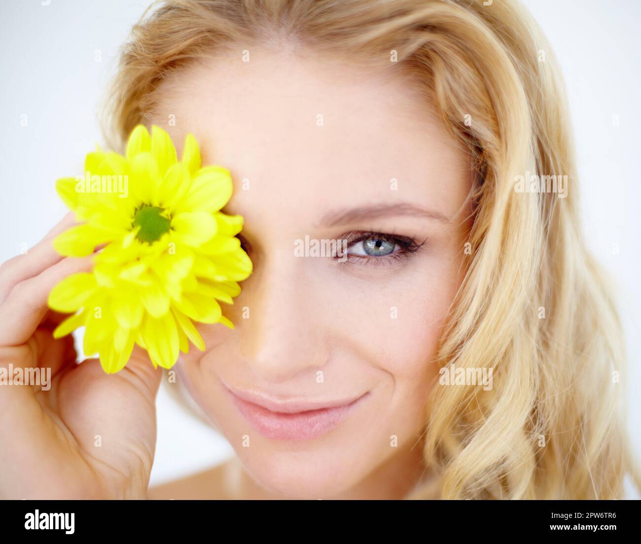 Woman flower over one eye hi-res stock photography and images - Alamy