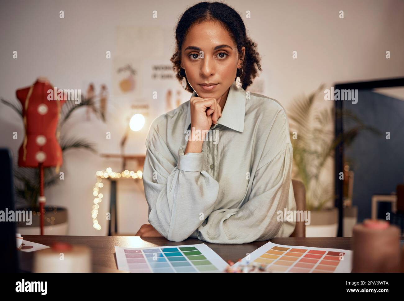 Black woman, creative designer and portrait in studio for inspiration ...