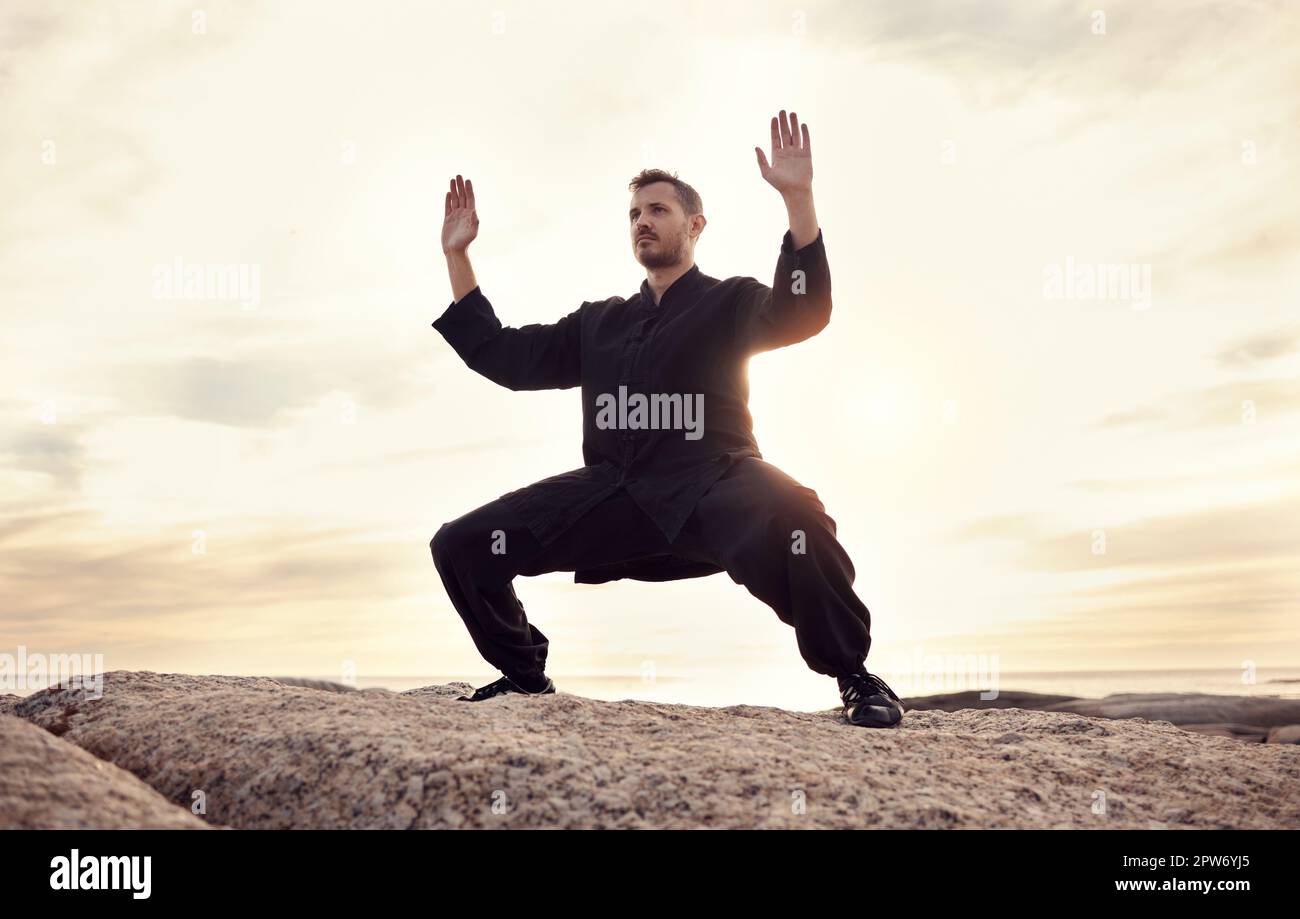 Karate, martial arts and man training by ocean for mindfulness, body ...