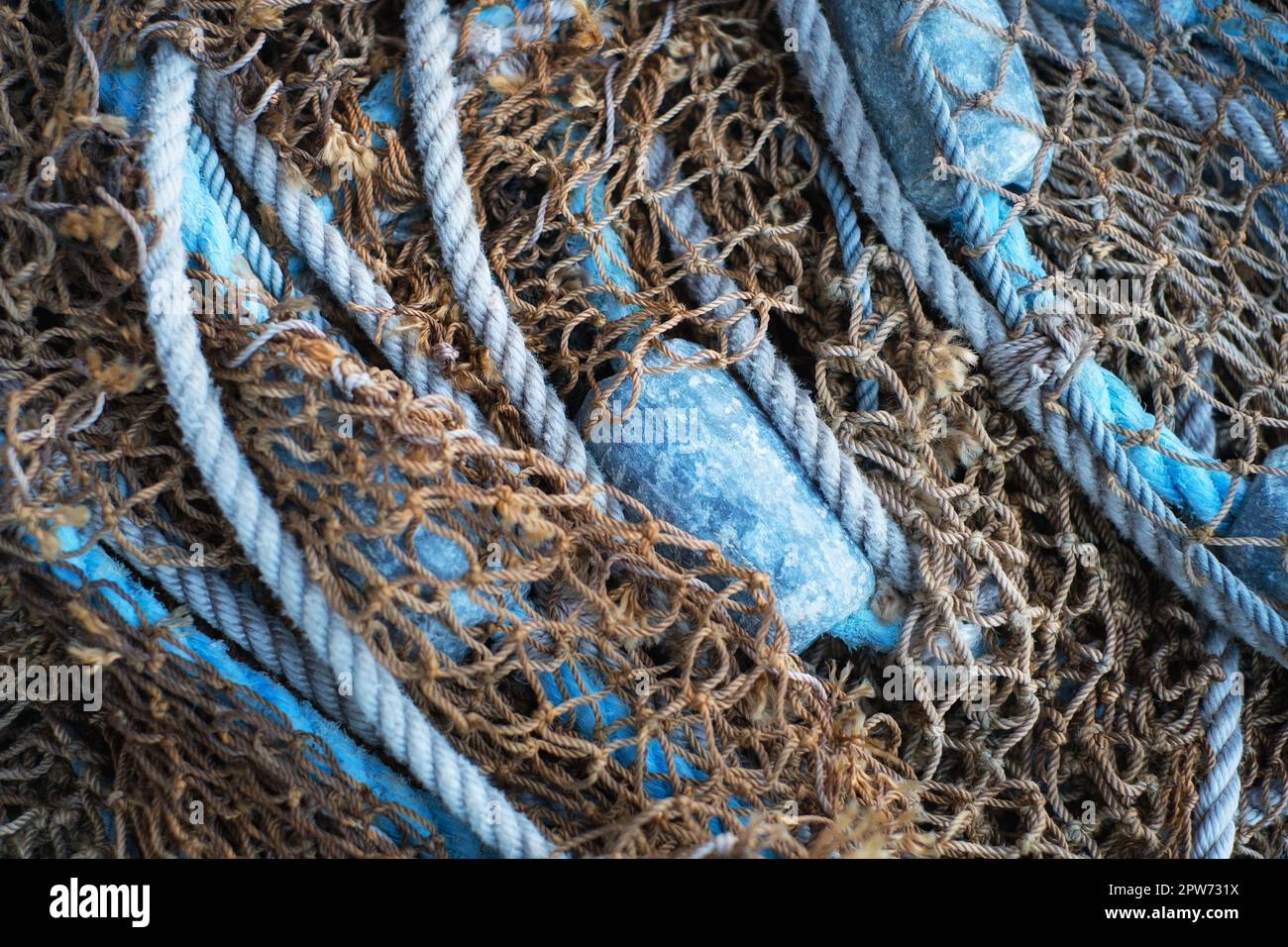 Buoys and a net tangible together as fishing gear or equipment at a ...
