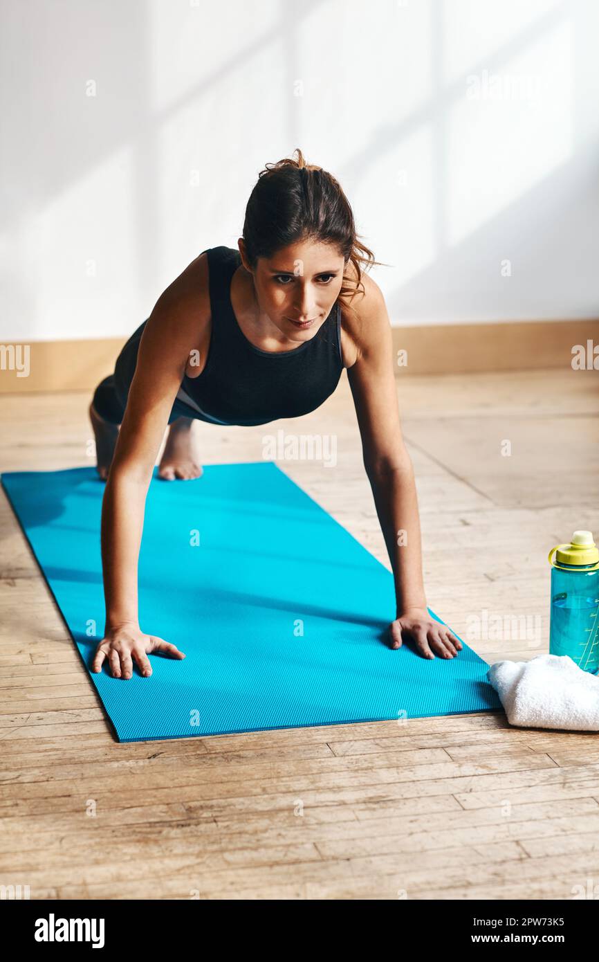 You are more powerful than you think. an attractive young doing pushups ...