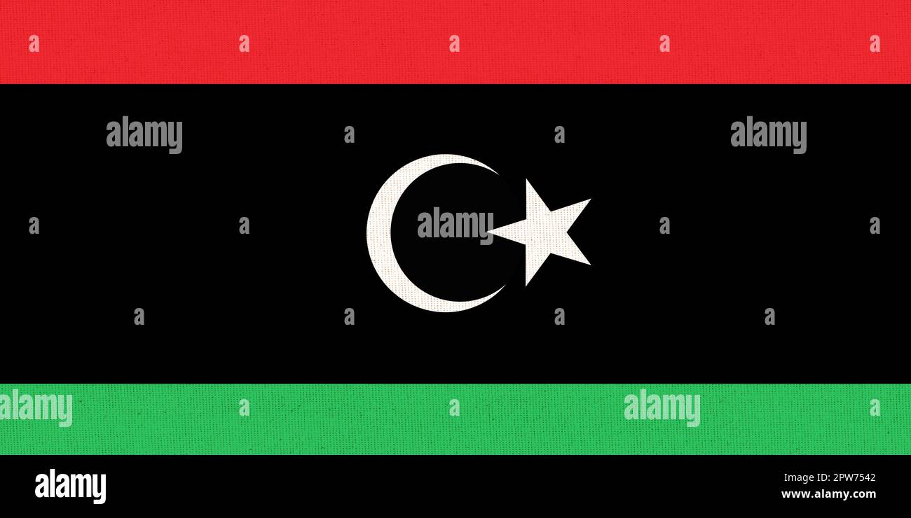 Flag of Libya. Libyan flag on fabric surface. Fabric texture. State of ...