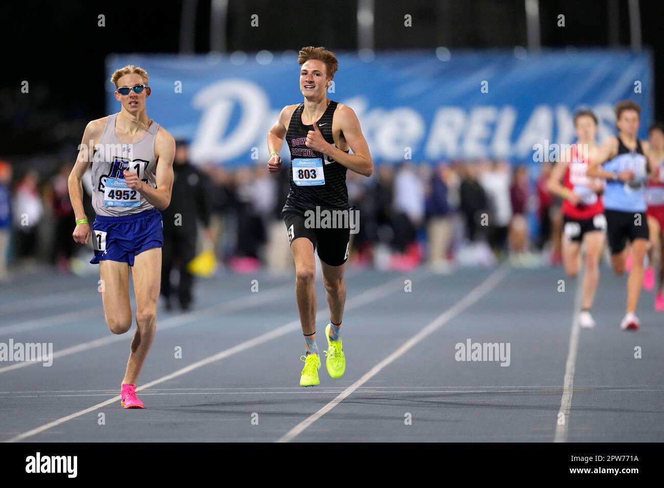 Stevens High School's Simeon Burnbaum, left, races to the finish line ...