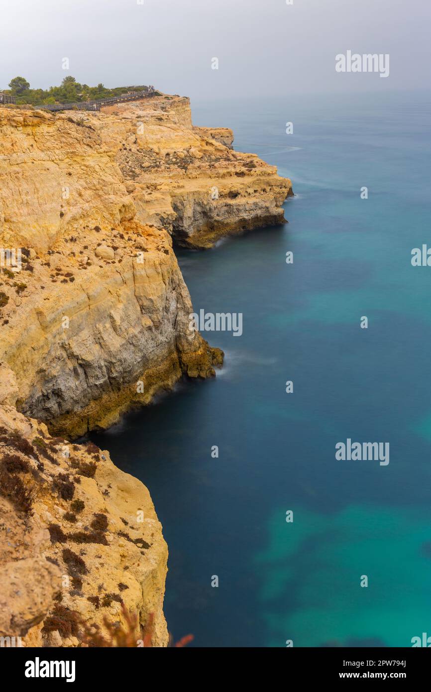 The famous coastline of Algarve in Portugal with Sandstone Cliffs ...