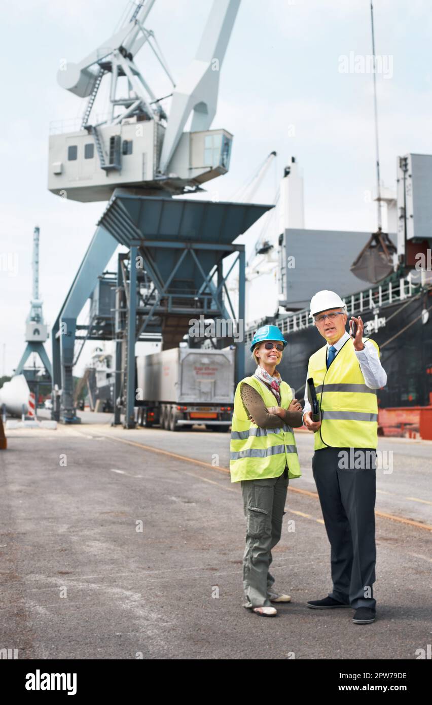 Logistics, supply chain and shipping with teamwork between a manager ...