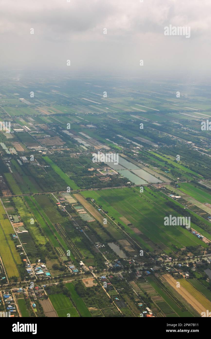 Crop fields and agricultural plantations on a rural area. Aerial view ...