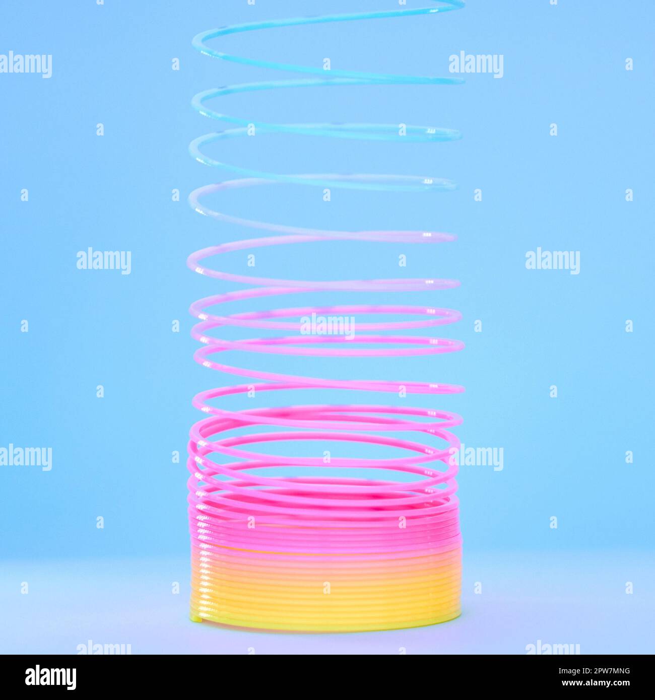 Plastic rainbow slinky hi-res stock photography and images - Alamy