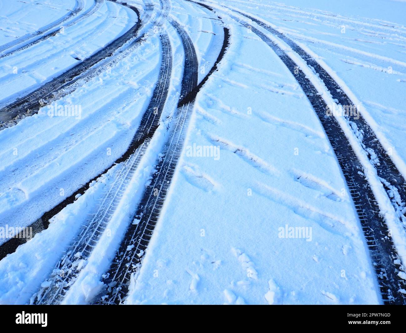 Snowdrifts on the side of the road. Bad weather and traffic. Snow on ...