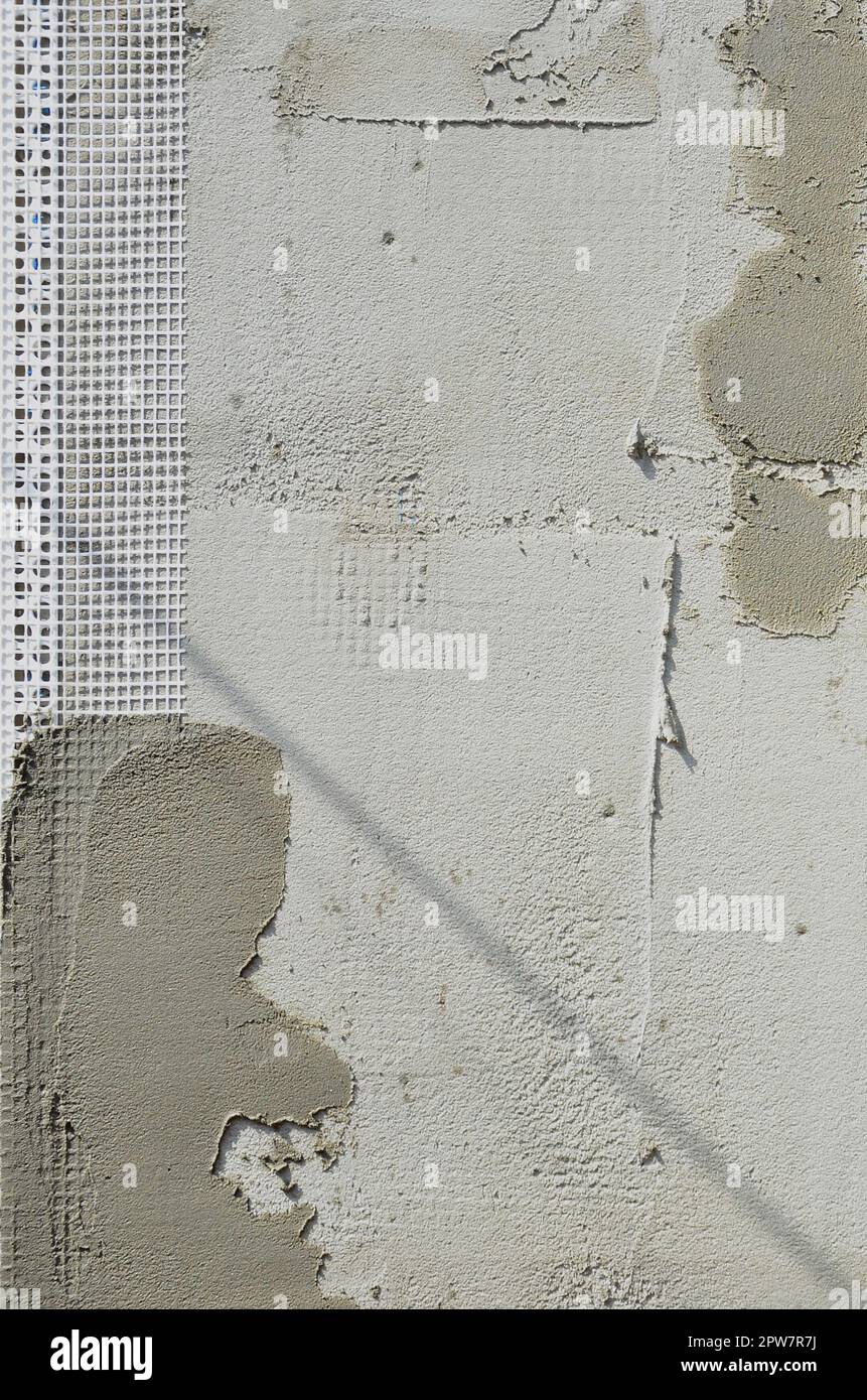 The texture of the wall, covered with gray polystyrene foam plates ...