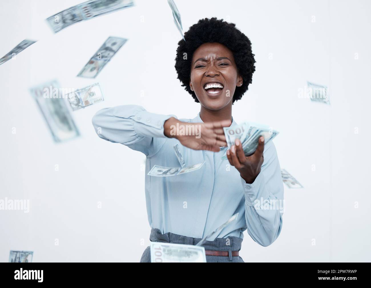 Mature african american businesswoman with an afro looking happy while ...