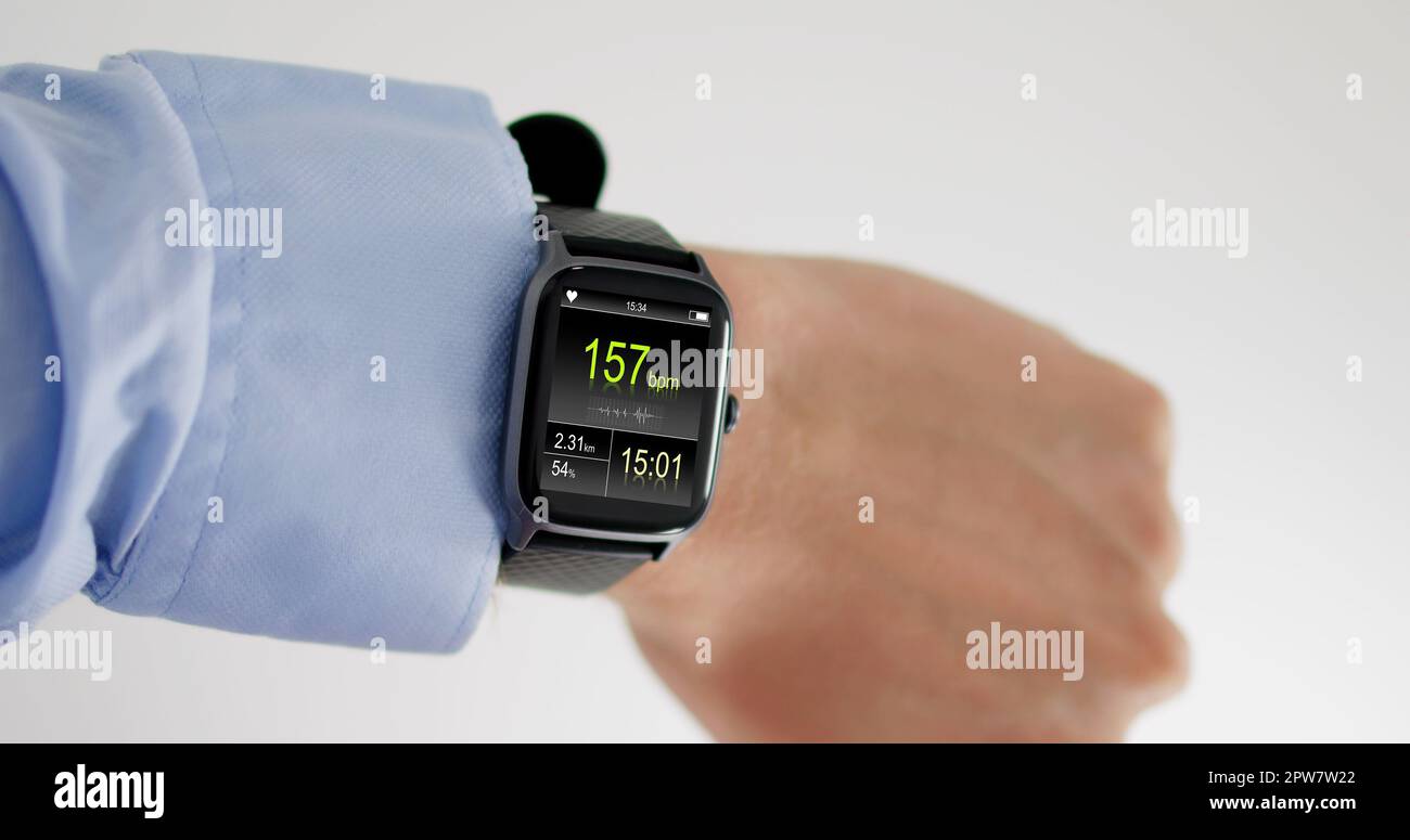 Smart Watch Showing Heartbeat Monitor On Man's Hand Stock Photo - Alamy