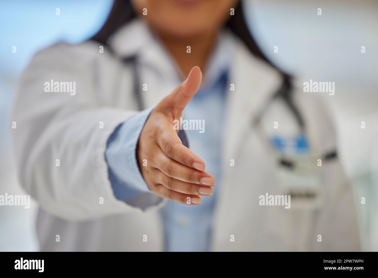 Closeup of hand of doctor ready for handshake. Female doctor ready to ...