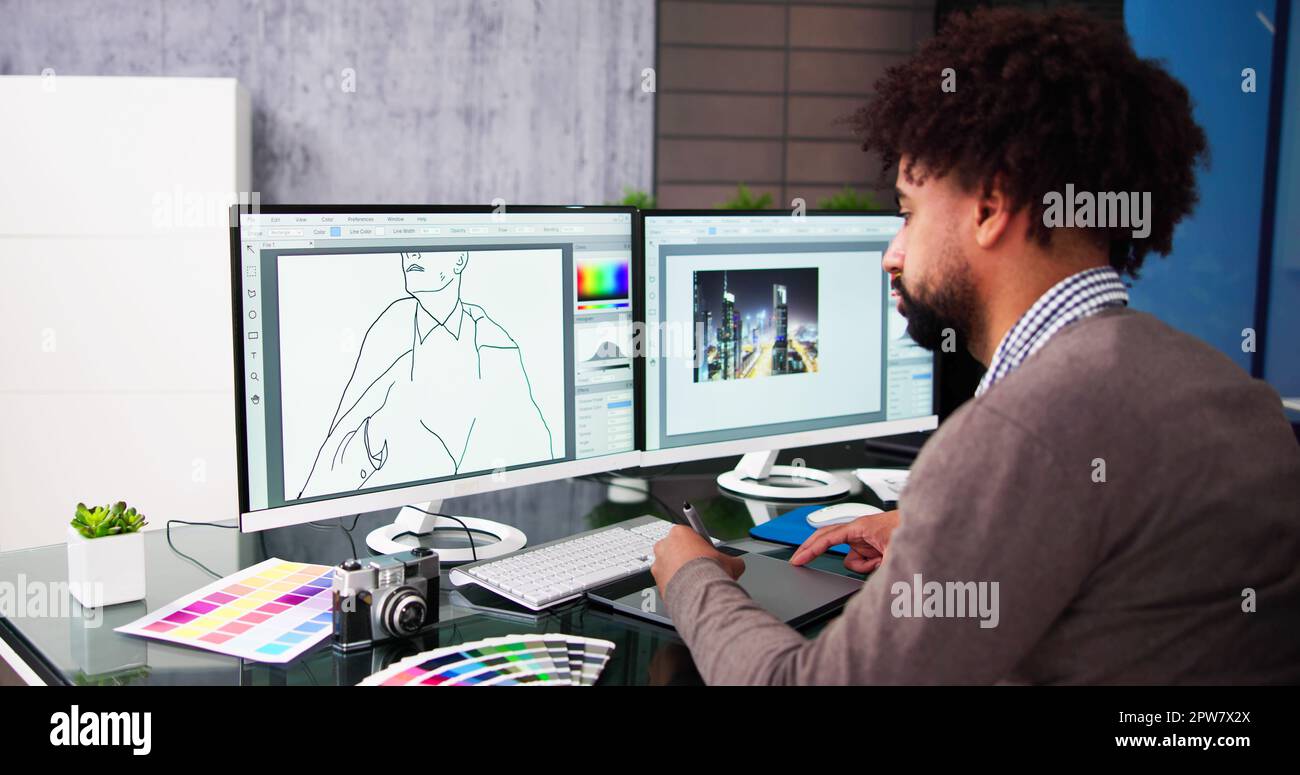 African Graphic Web Designer Using Design Editing Software Stock Photo ...