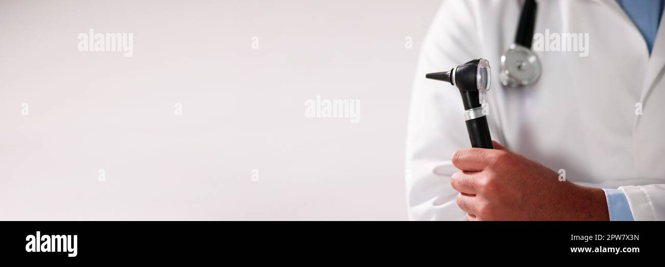 Audiology Hearing Care Medical Doctor With Otoscope Stock Photo - Alamy
