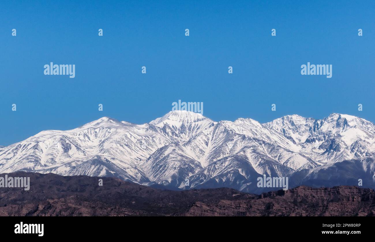 Snowy Andes mountains, as seen from Potrerillos, Mendoza, Argentina, in ...