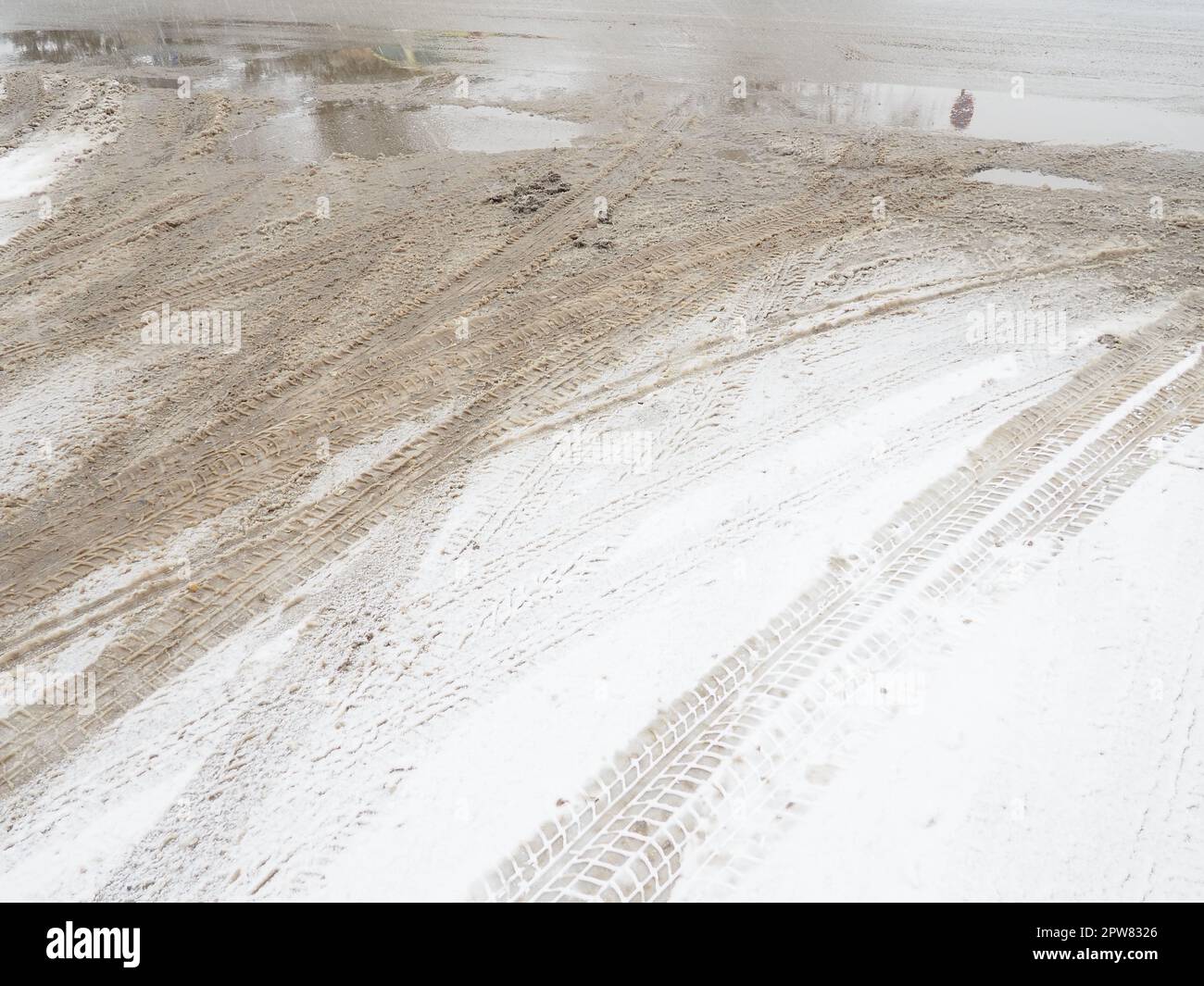 A fork or siding from a roundabout. Snowdrifts on the side of the road ...