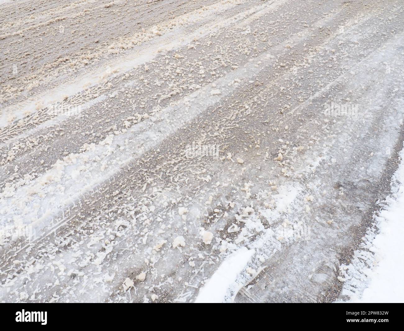 Snowdrifts on the side of the road. Bad weather and traffic. Snow on ...