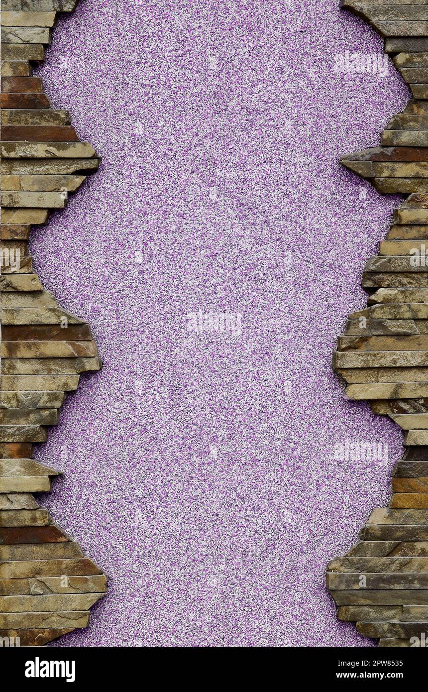 Plastered and treated purple concrete wall with a beautiful frame of ...