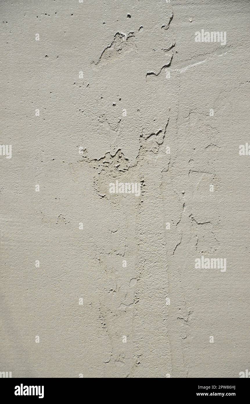 The texture of the wall, covered with gray foam polystyrene plates ...