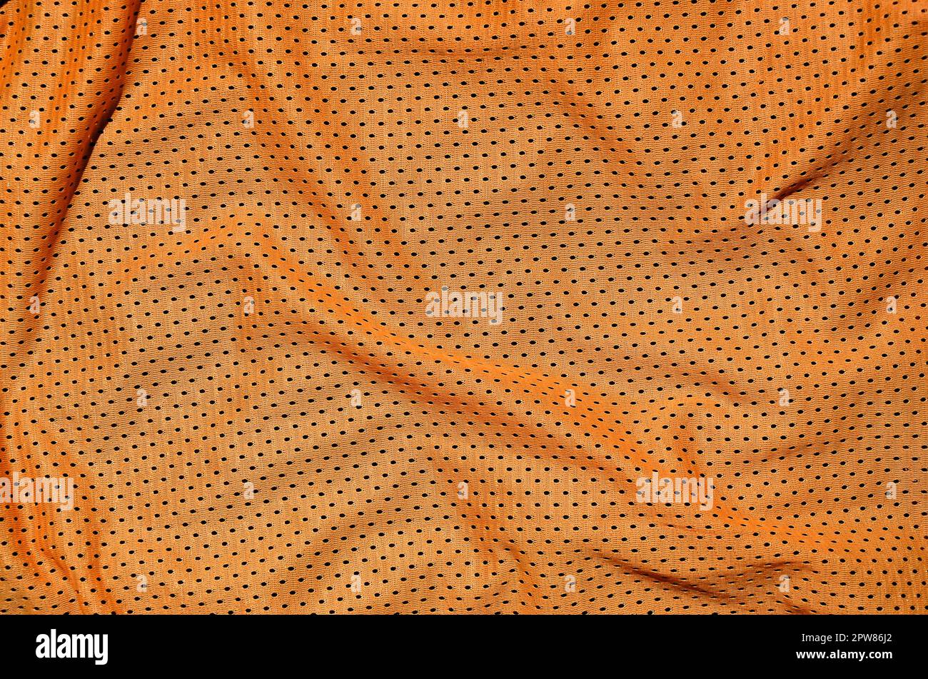 Orange sport clothing fabric texture background. Top view of orange ...