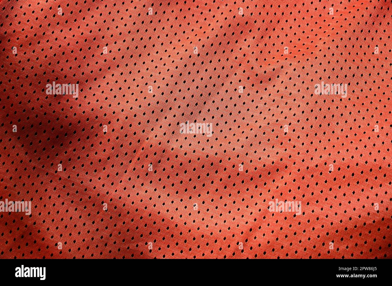 Sport clothing fabric texture background, top view of red cloth textile ...