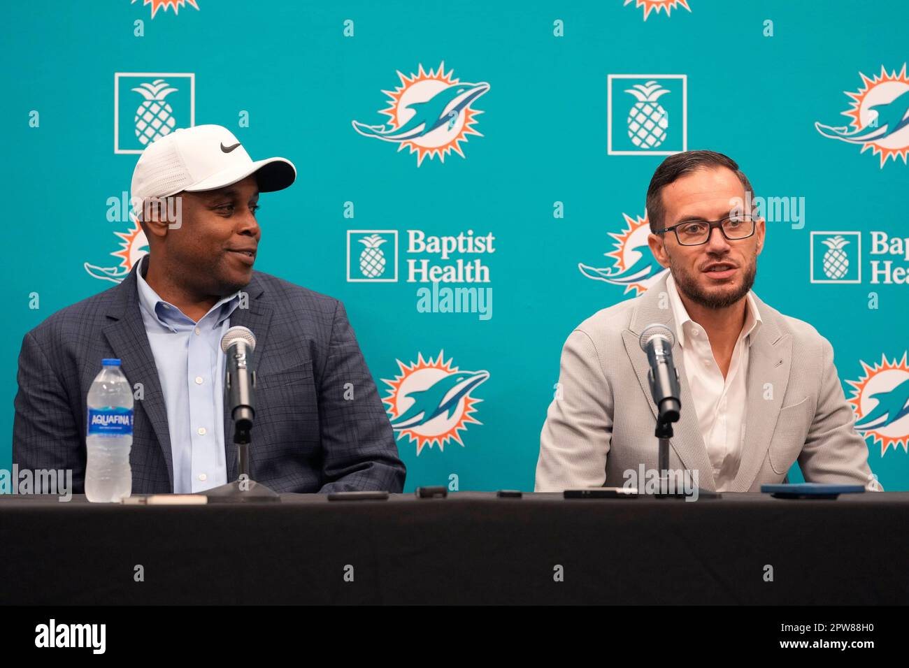 Miami Dolphins general manger Chris Grier, left, and head coach Mike ...