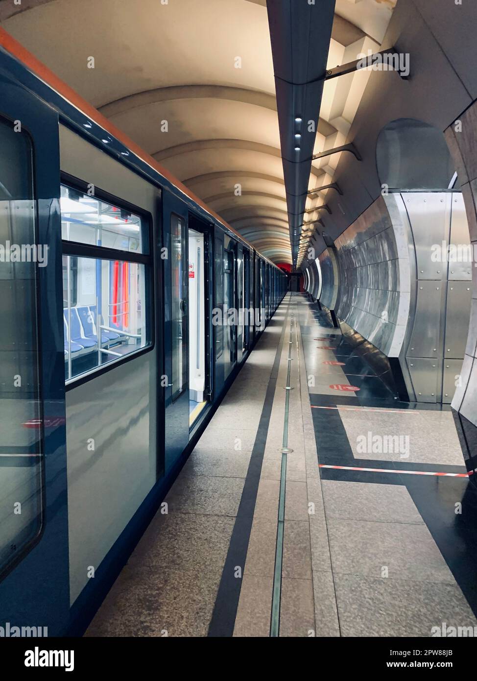 An empty underground metro station after a working day. The doors of ...