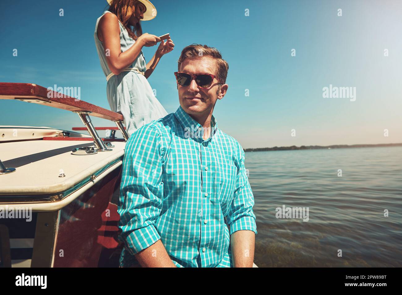 Living that high life on the high seas. a young couple going on a boat ...