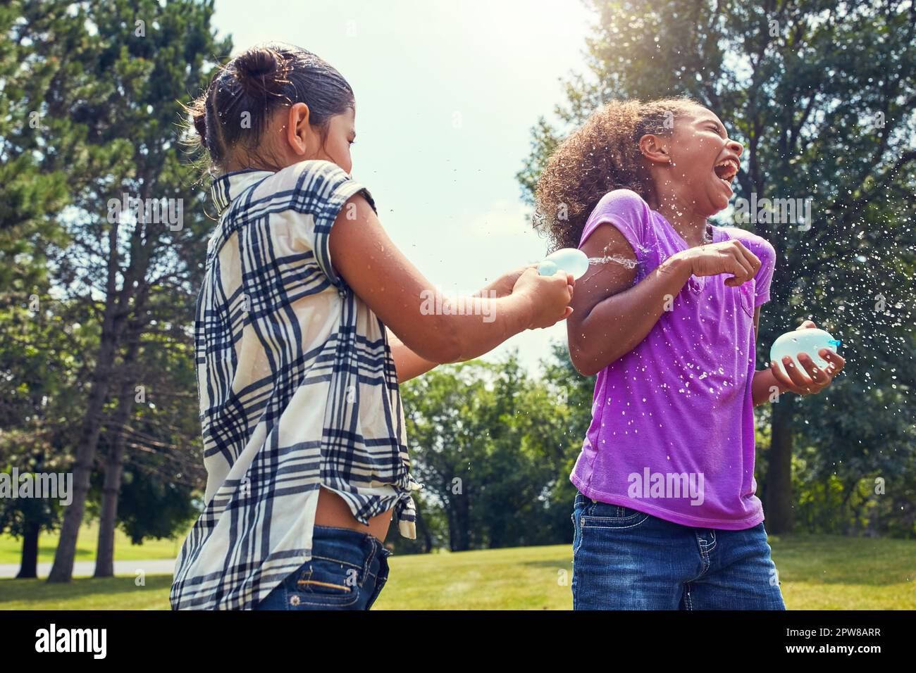 Hot summer days deserve a water balloon fight. adorable little girls ...