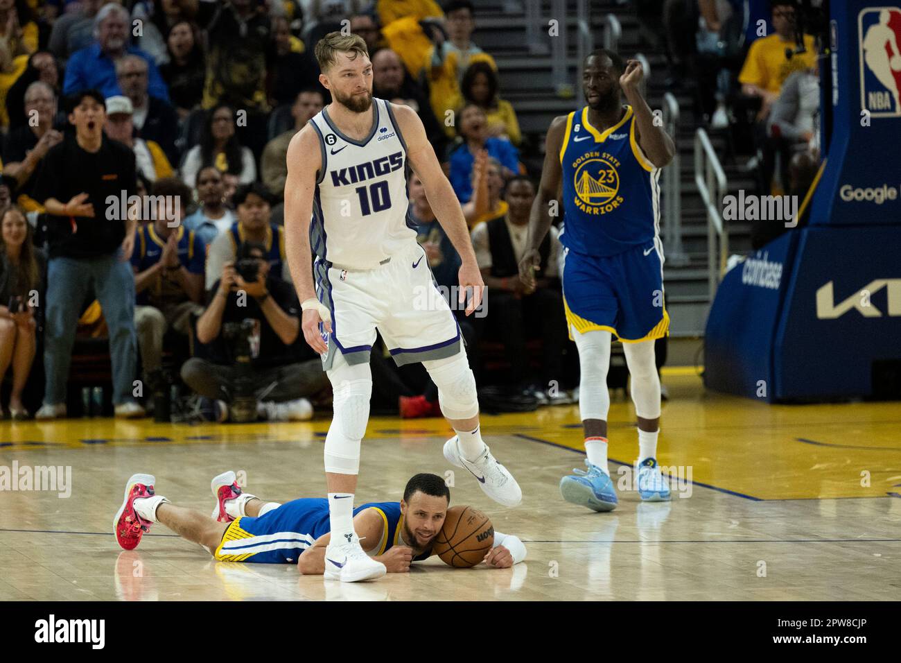 San Francisco, CA, USA. 28th Apr, 2023. Sacramento Kings center Domantas Sabonis (10) steps over ...