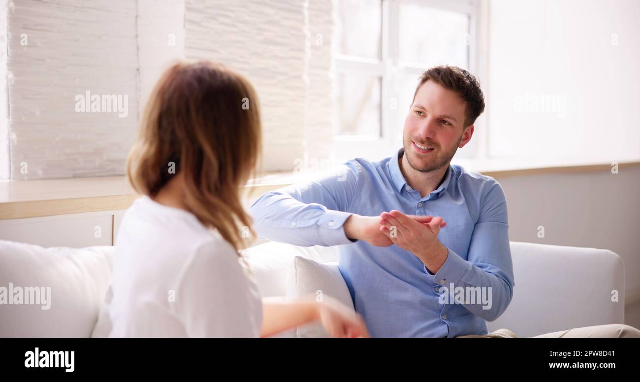 Learning Sign Language. Person With Audiology Disabilities Stock Photo ...