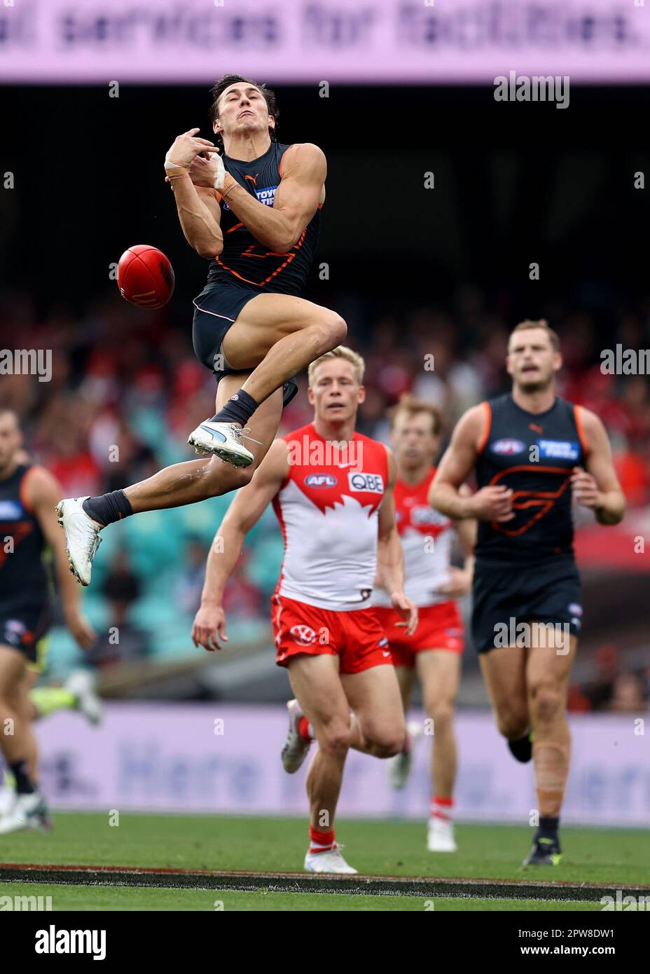 Isaac Cumming of the Giants attempts to mark the ball during the AFL ...