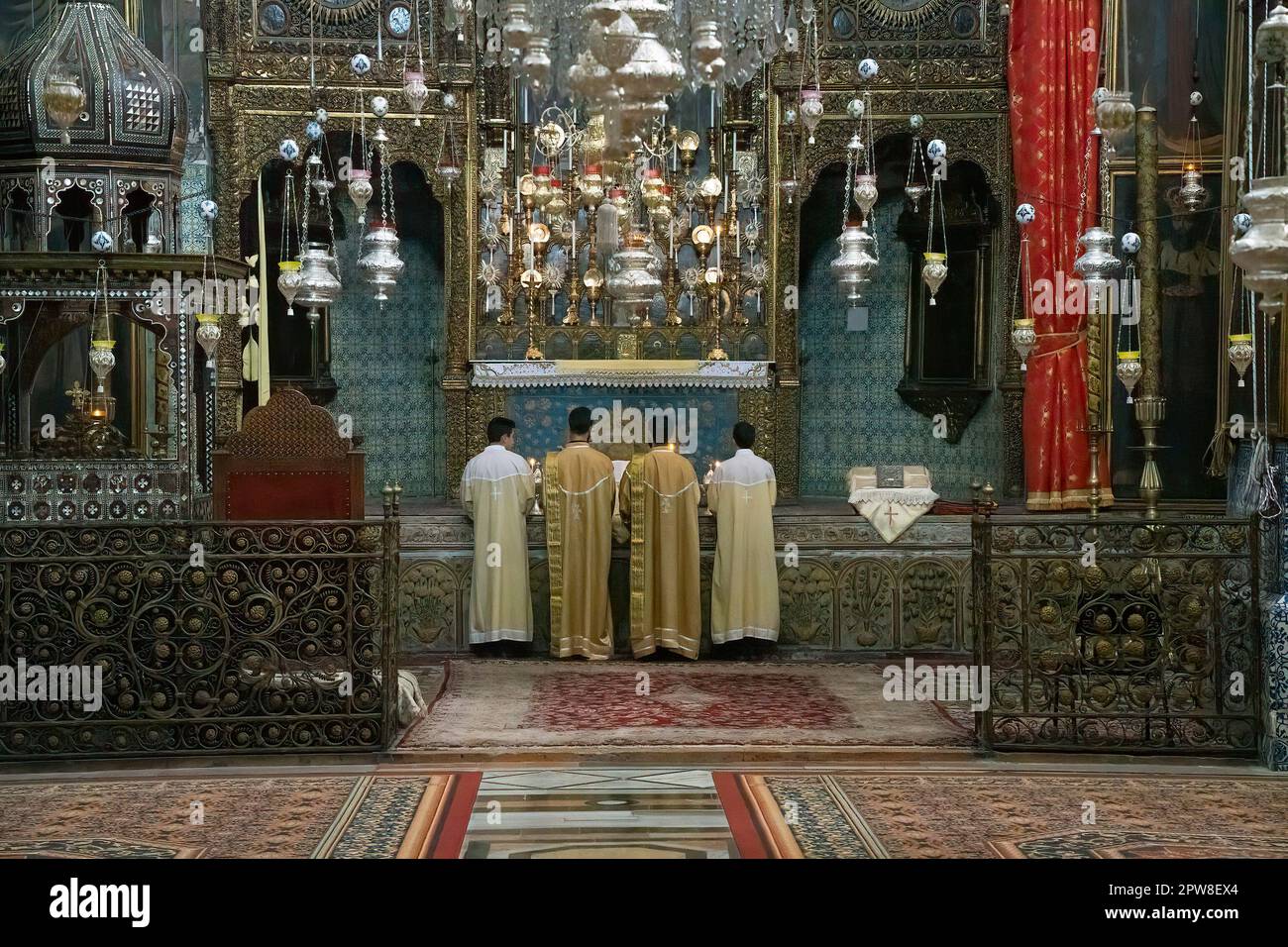 Jerusalem, Israel - November 12th, 2022: Four priests at mass in the St ...