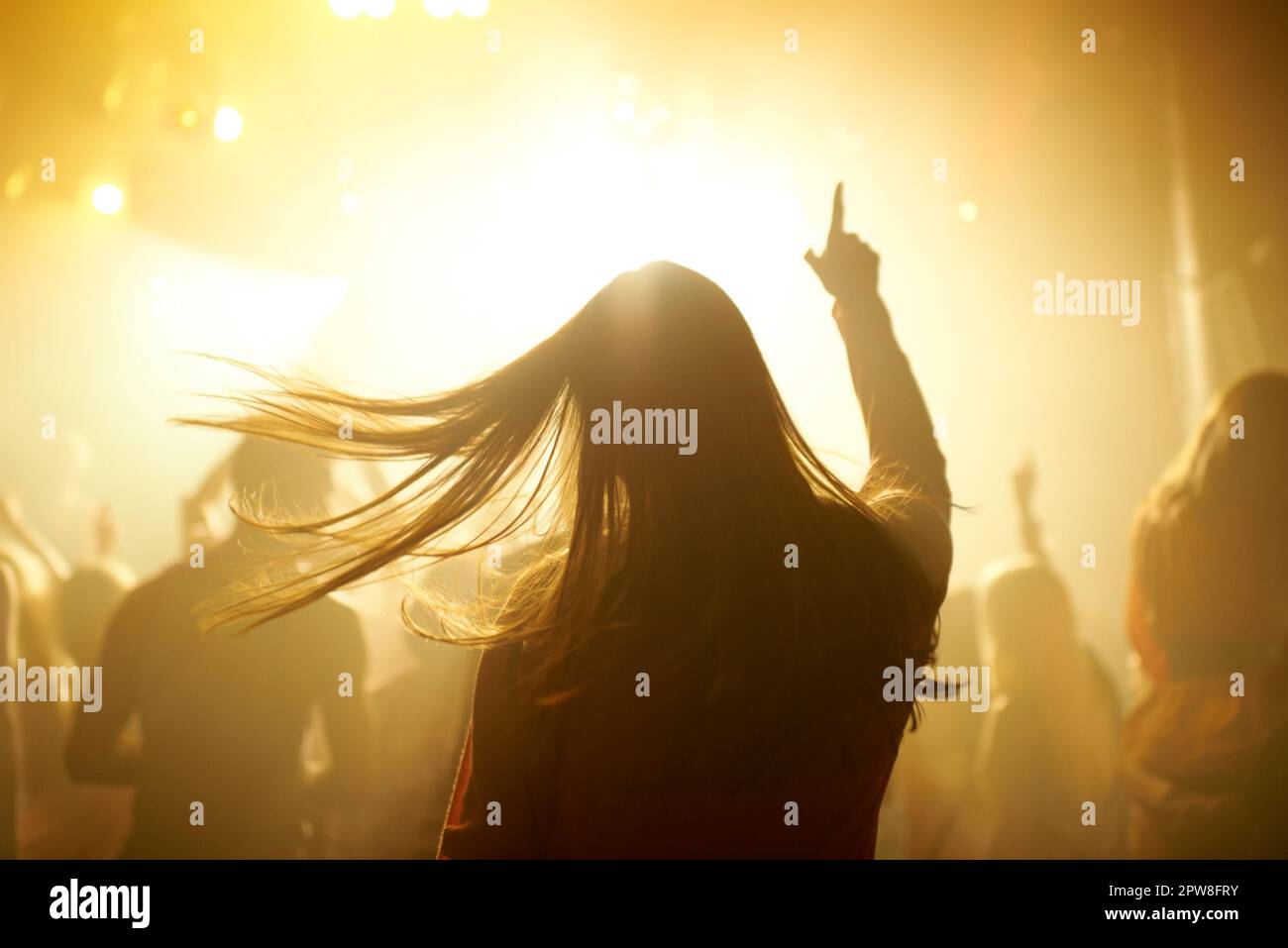 Dance, music and back of woman at a concert, disco event or psychedelic ...