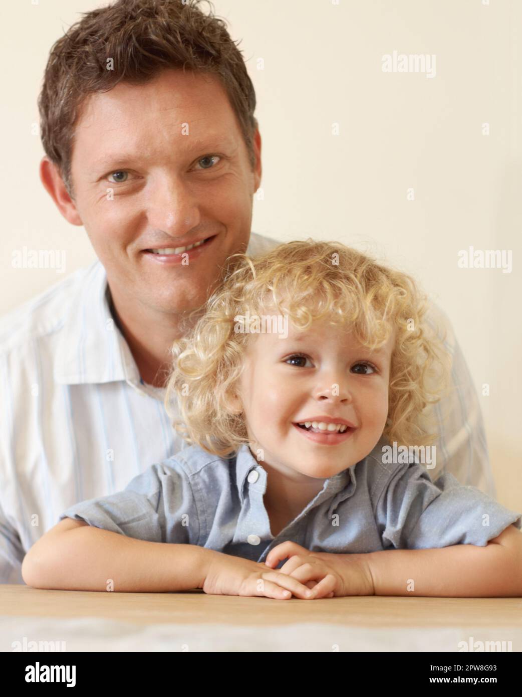 Happy family, love and portrait of father with smiling son at their home. Happiness or quality ...
