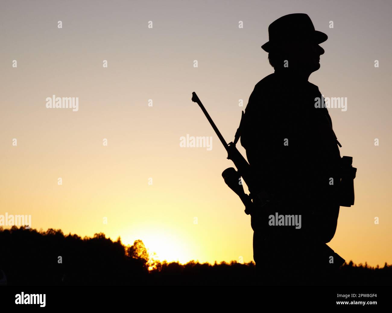 Hunting at sunset, man with rifle and mockup in nature to hunt game for ...