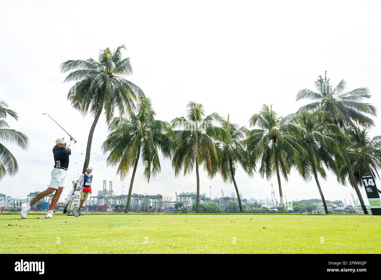 Captain Sergio Garcia of Fireballs GC hits his shot from the 14th tee ...