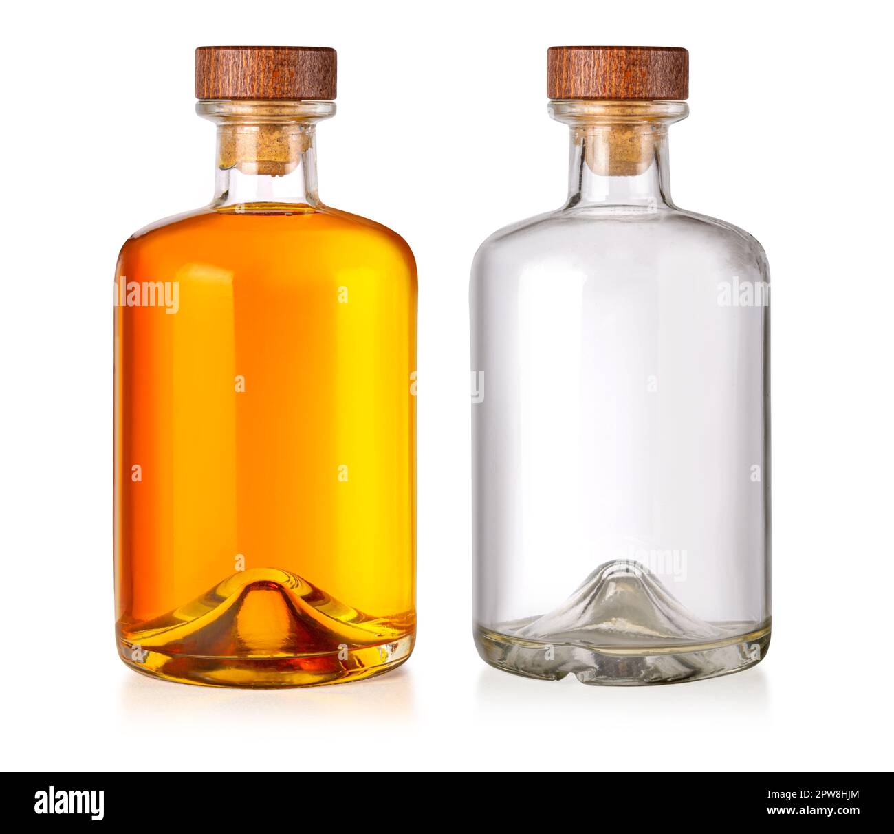 A full bottle of whiskey and empty isolated on a white background Stock ...