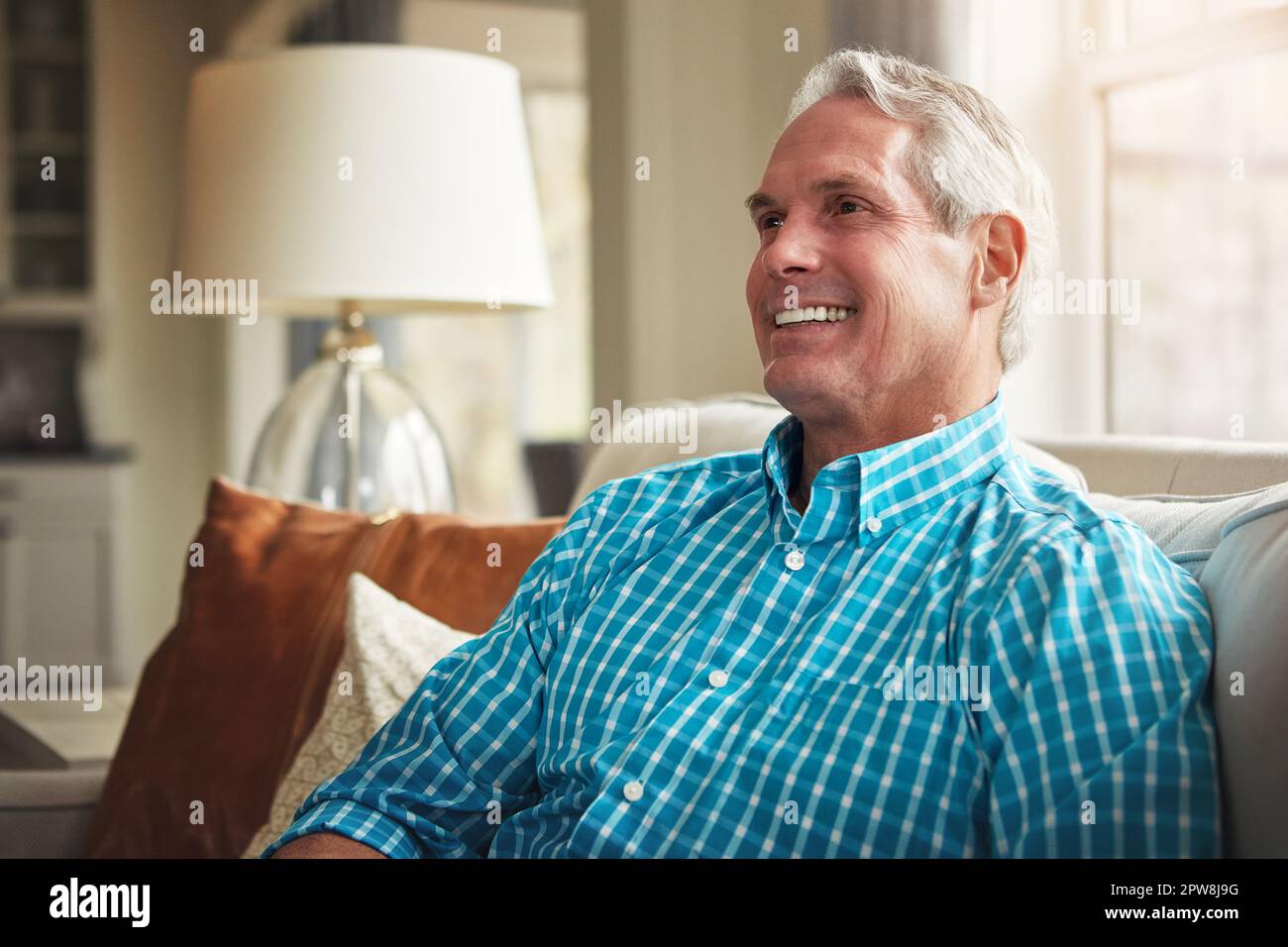 Enjoying the perks of a well planned for retirement. a happy mature man ...