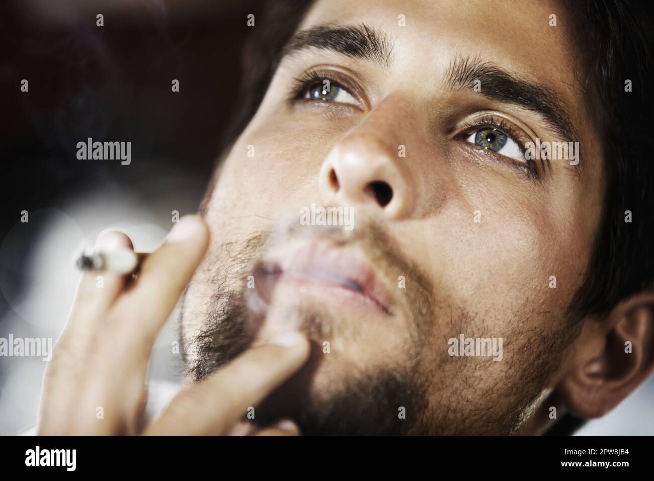 Thinking, smoke and man with a cigarette, ideas and thoughtful with ...