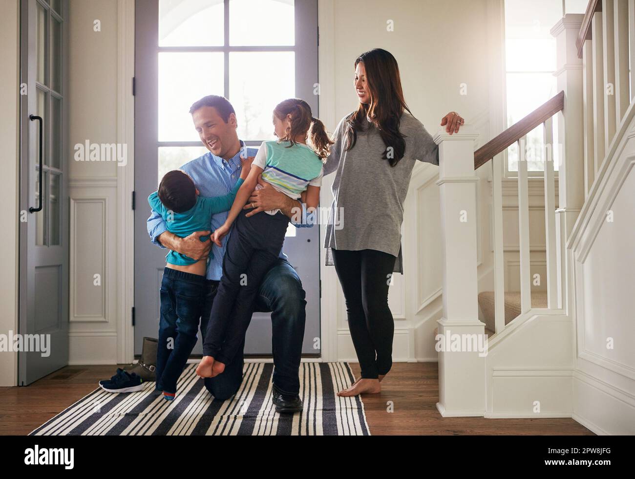 This is what its all about. a father arriving home to a loving welcome ...