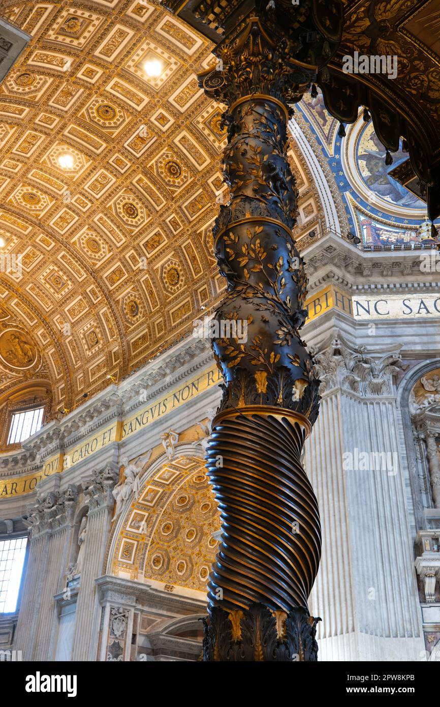 Twisted bronze column of the Baldacchino by Bernini, adorned with ...