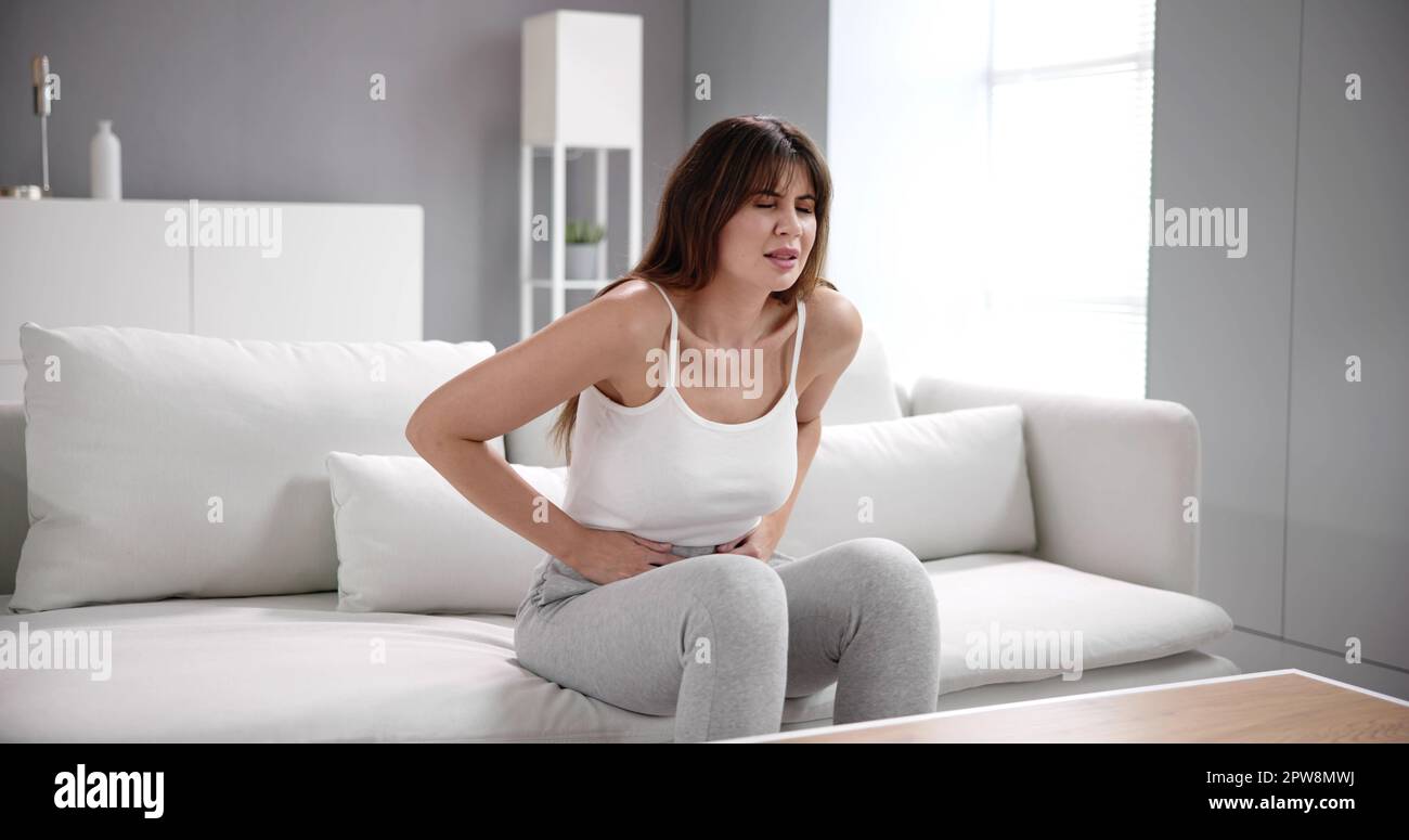 Women PMS Stomach Pain And Digestion Problem Stock Photo - Alamy
