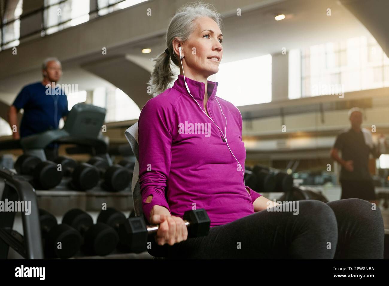 Weight lifting got me feeling young again. Portrait of a senior woman ...