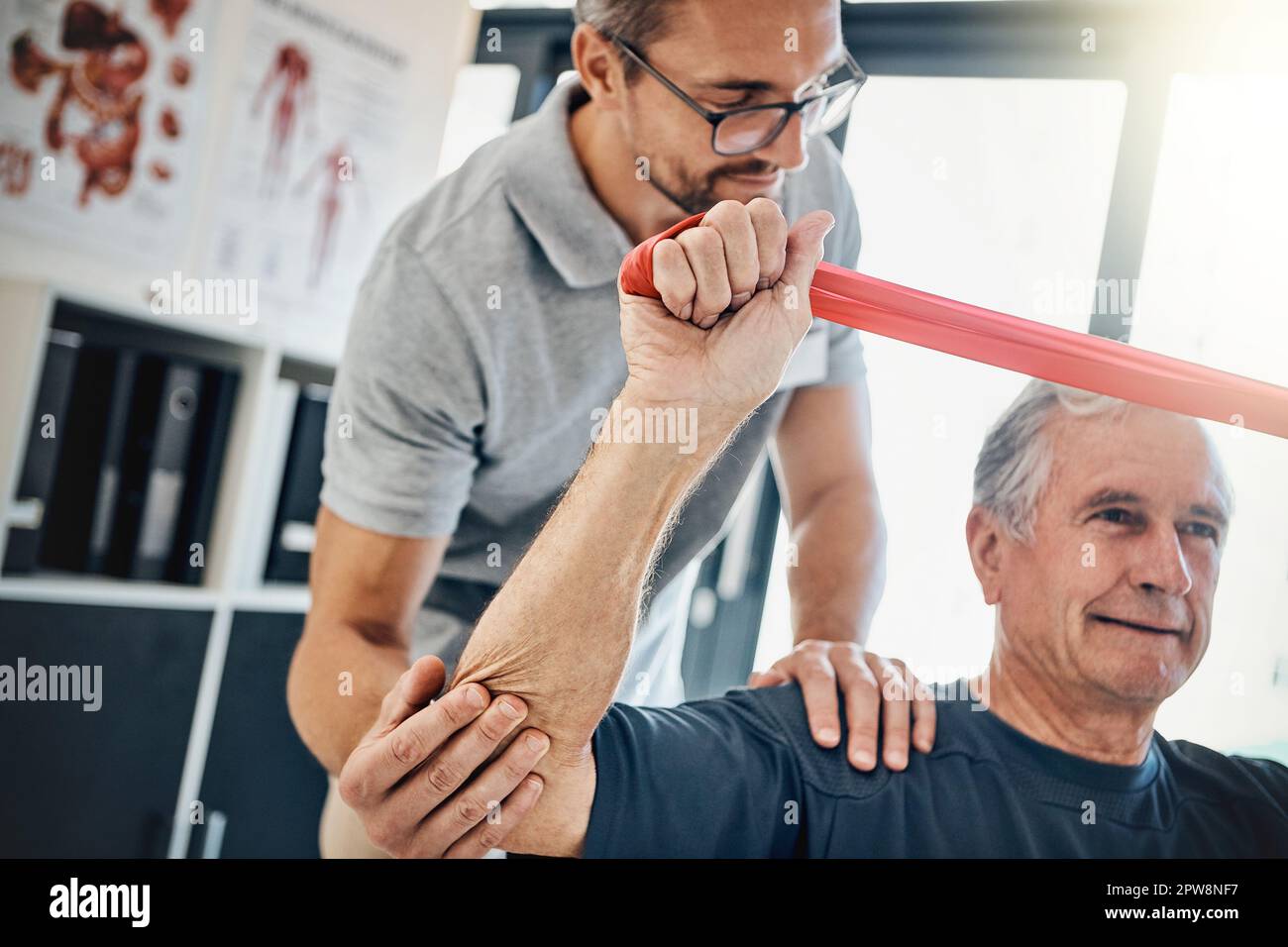 Hes still going strong. a friendly physiotherapist helping his mature ...