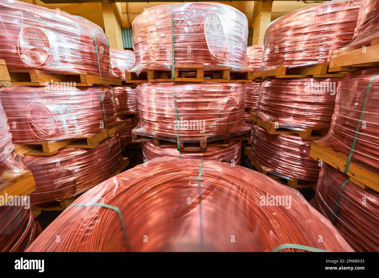 Stacks of copper wire rods in production plant warehouse Stock Photo ...