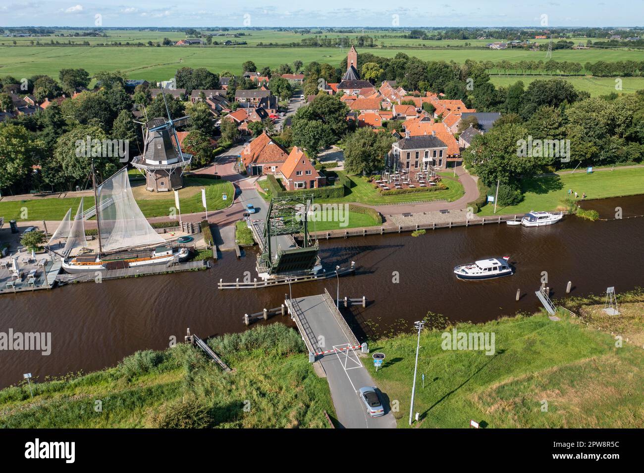 The Netherlands, Garnwerd, along the Reitdiep canal. A small yacht ...