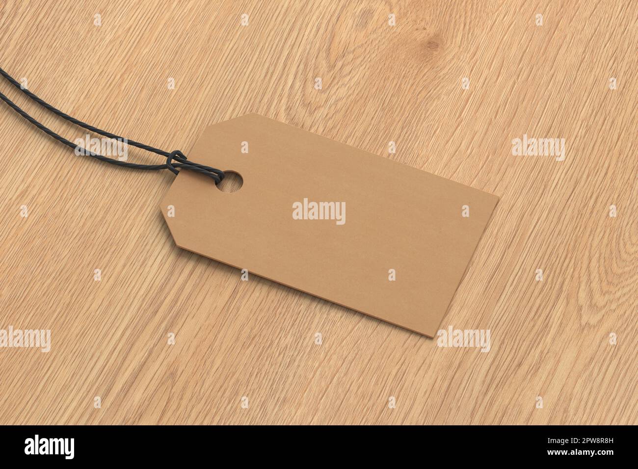 Cardboard tag mockup on wooden background. Side view Stock Photo - Alamy