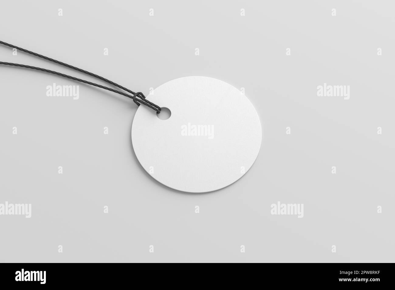 White round tag mockup on white background. Side view Stock Photo - Alamy