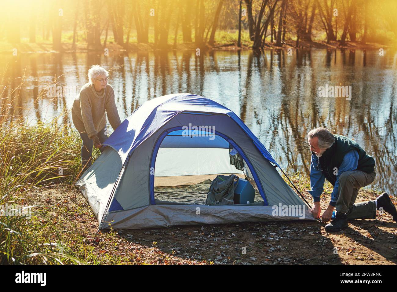 Getting ready for their weekend with nature. a senior couple setting up ...